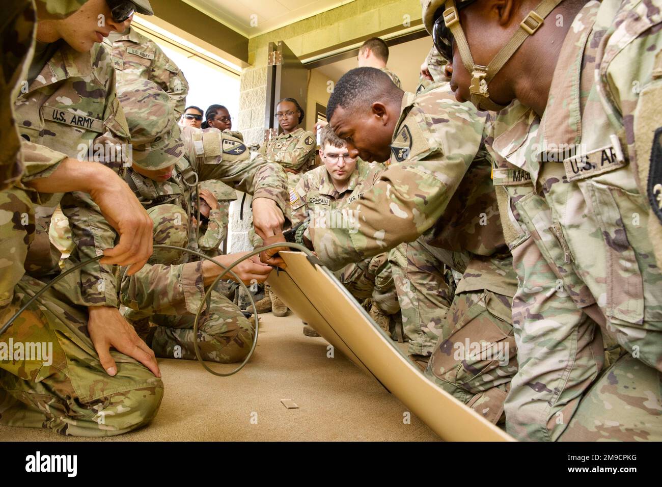 Soldiers with the 61st Troop Command prepare an explosive concrete ... Soldiers with the 61st Troop Command prepare an explosive concrete ...