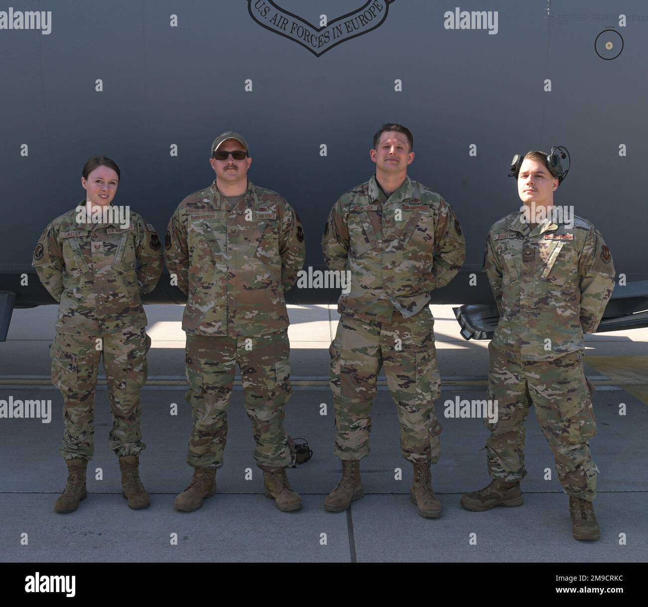 Airmen from the 86th Maintenance Group stand next to a C-130J Super ...