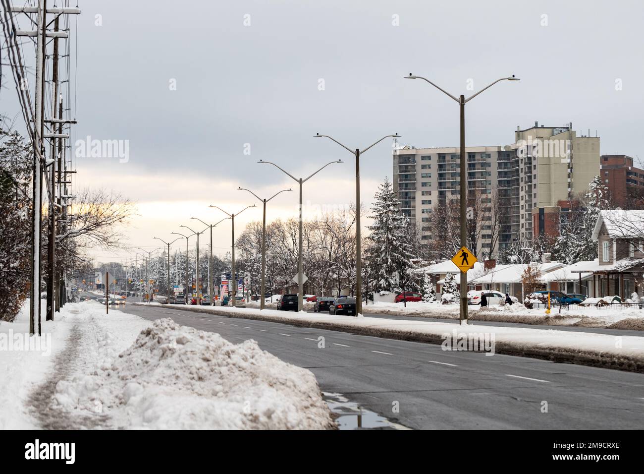 Canada, Ottawa - December 17, 2022: Road cleaned of snow. Residential ...
