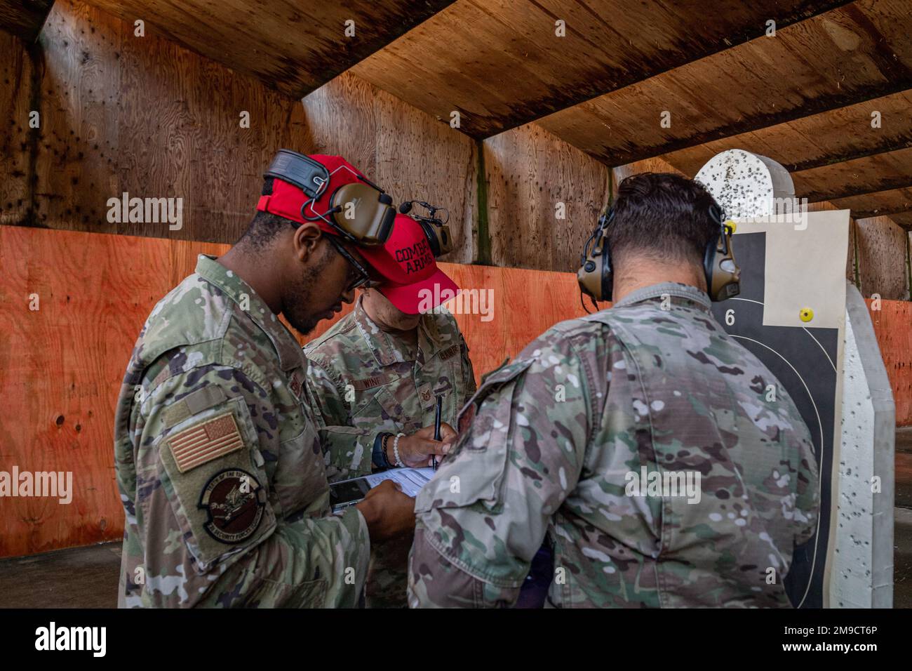 U.S. Air Force Staff Sgt. Tyler Herbert, left, 23rd Security Forces ...