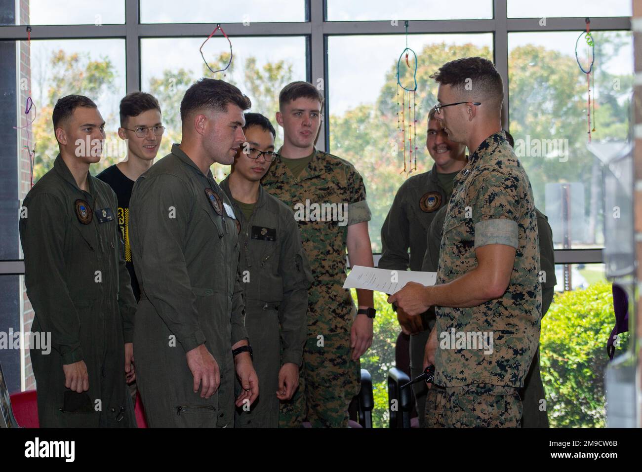 U.S. Marine Corps Cpl. Logan Youngblood, a range coach assigned to ...