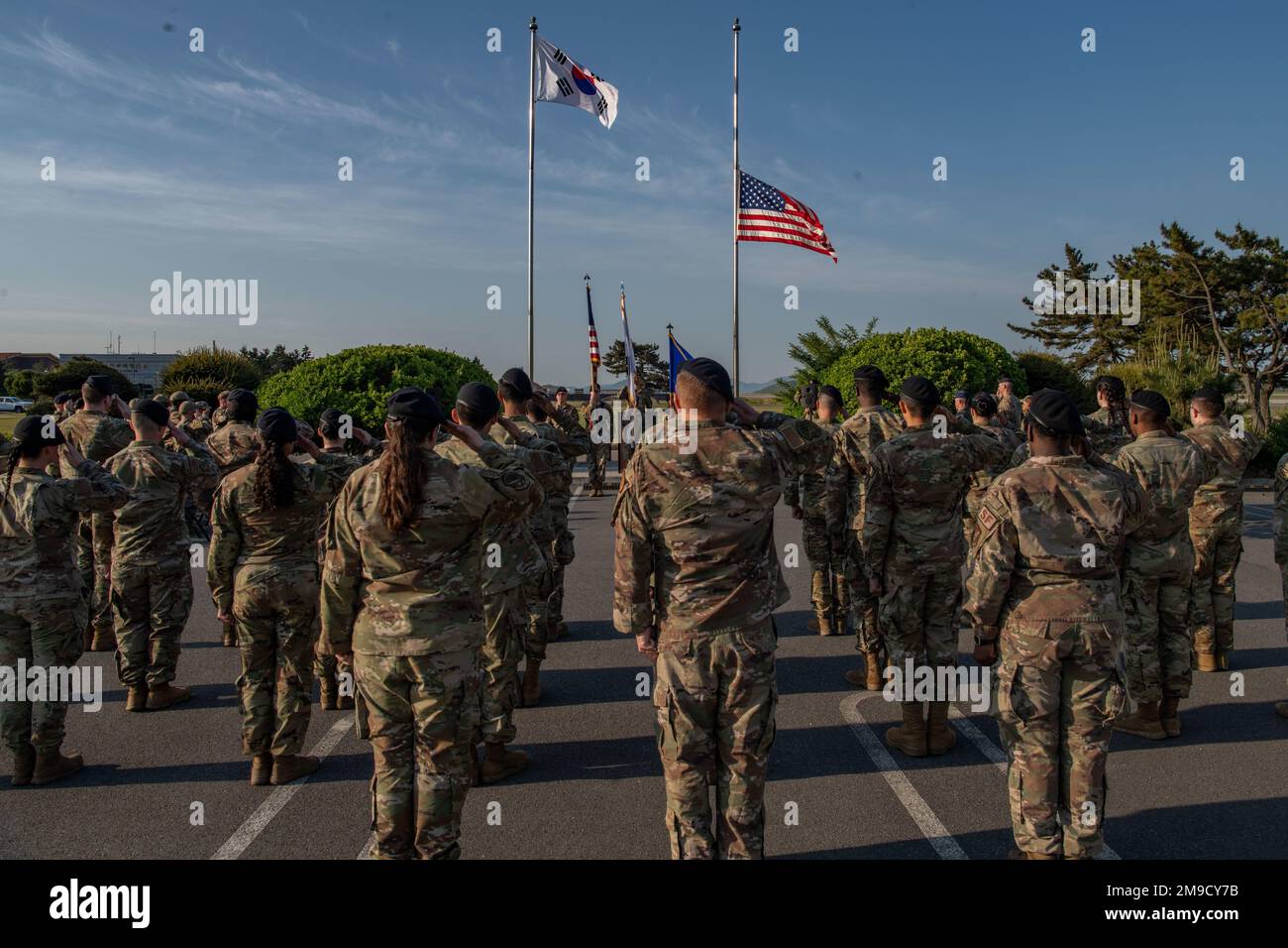 Airmen from the 8th Security Forces Squadron render a salute during ...