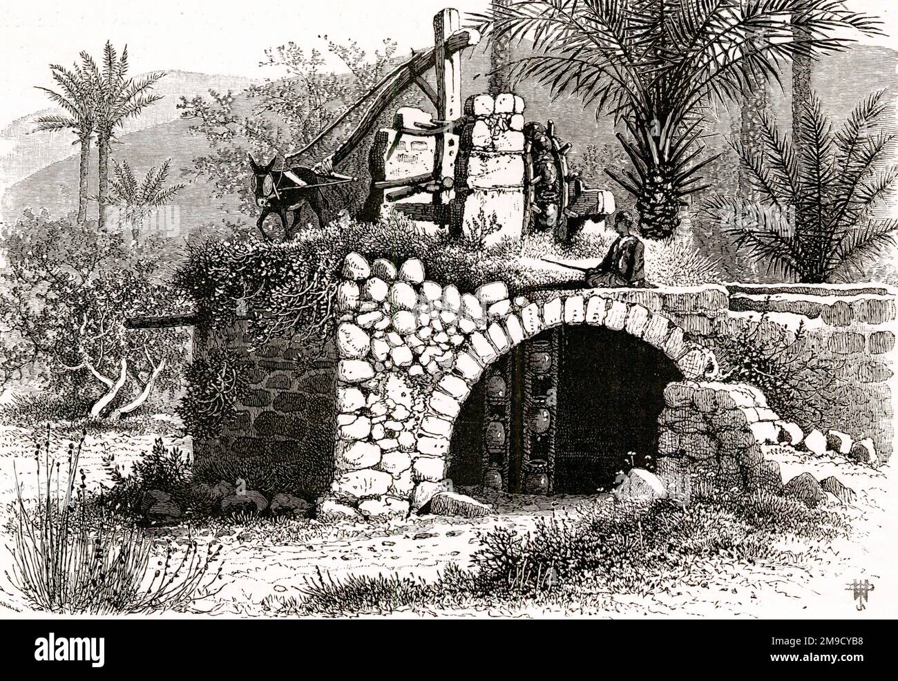 Water Wheel In Middle East Stock Photo - Alamy