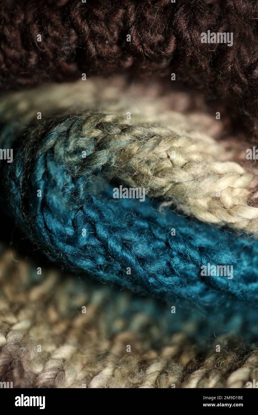 Colorful handmade winter traditional scarf with alpacas wool close up ...