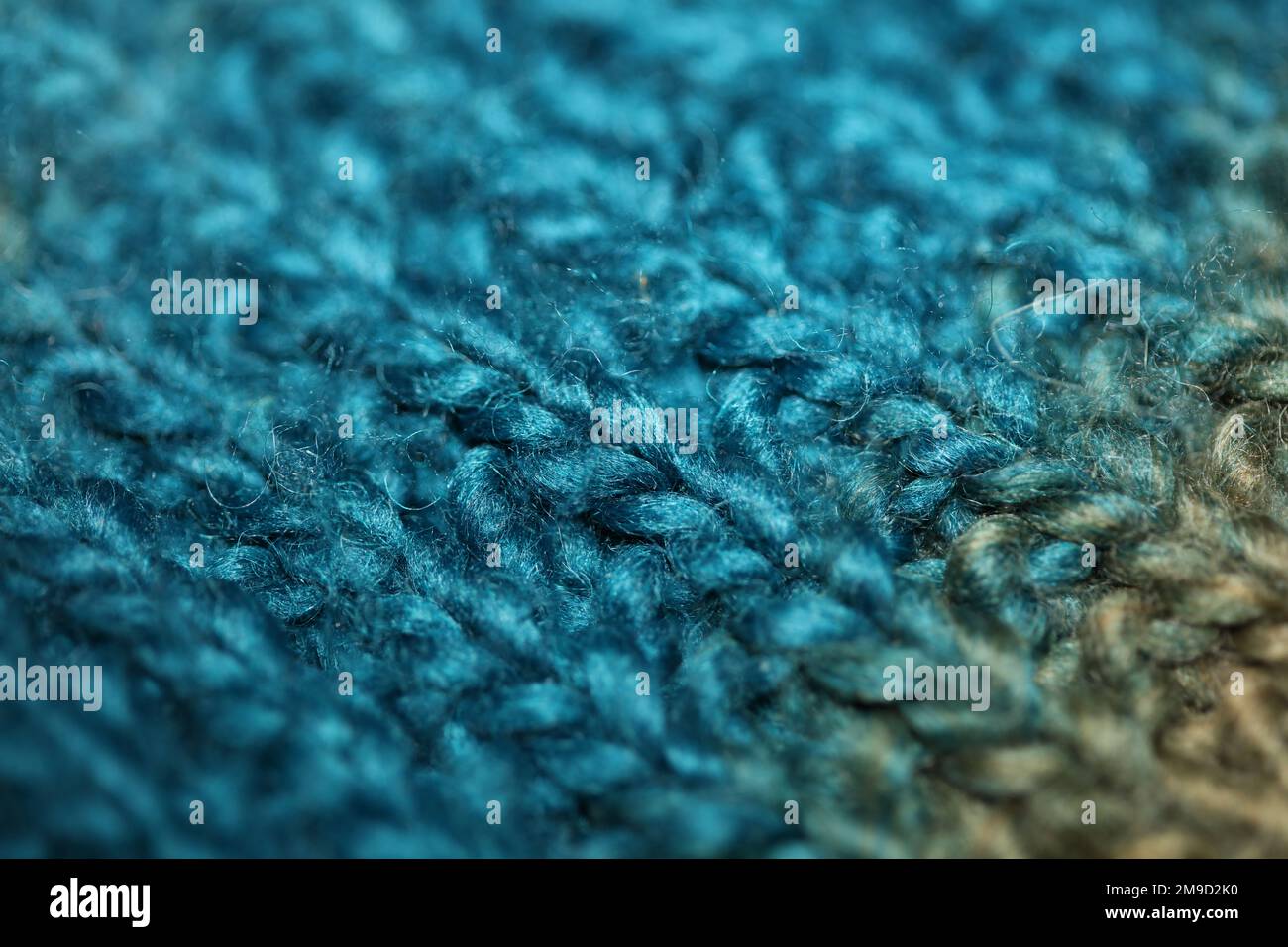 Colorful handmade winter traditional scarf with alpacas wool close up ...