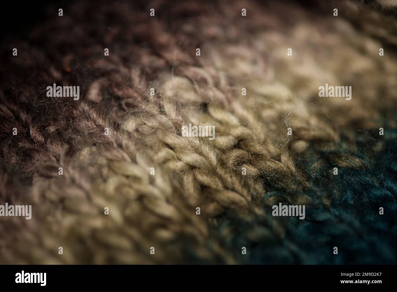 Colorful handmade winter traditional scarf with alpacas wool close up ...