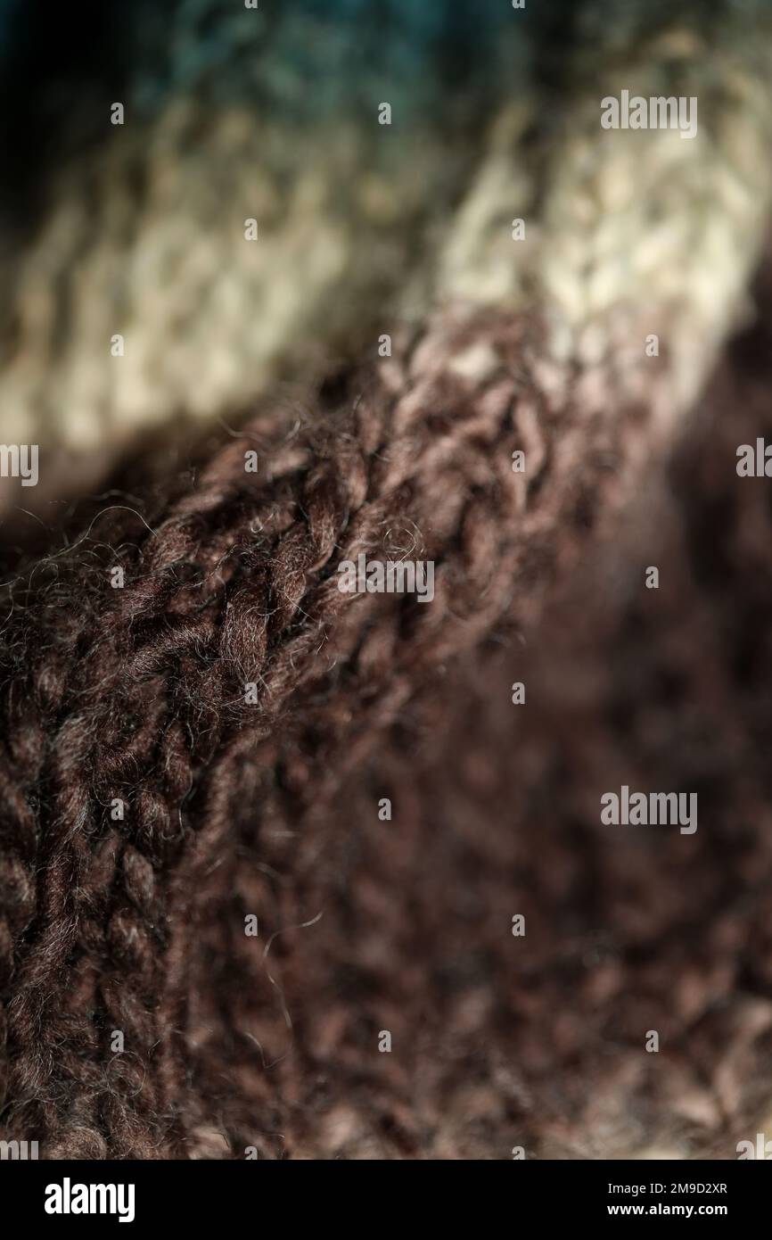 Colorful handmade winter traditional scarf with alpacas wool close up ...