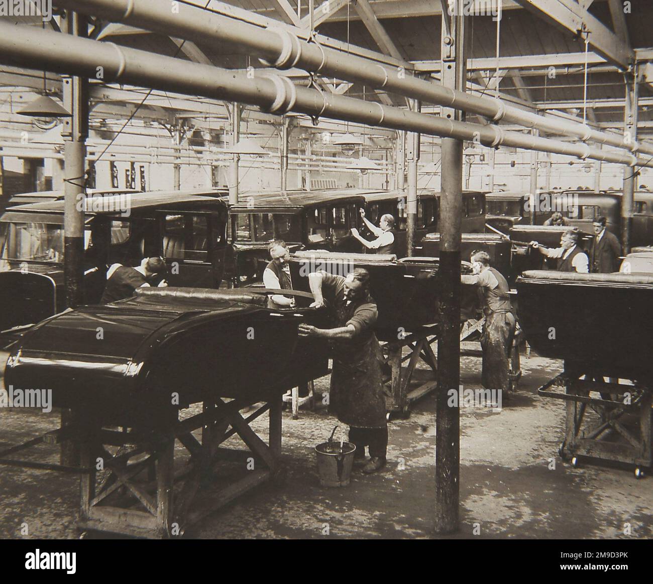 Body painting, workers painting and polishing automobile metal outer ...