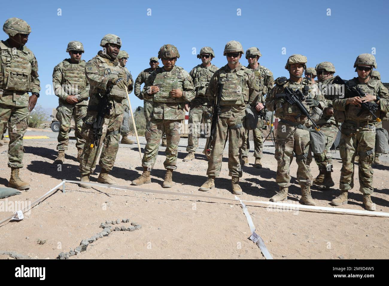 An 11th Air Defense Artillery Brigade Solider walks Sgt. Maj. Jacinto ...