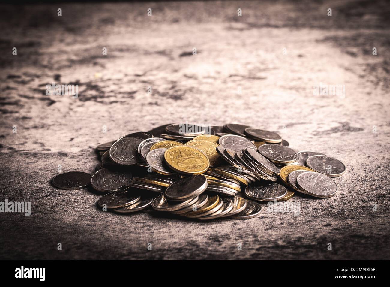Coins on gray background. Investment finance concept Stock Photo - Alamy