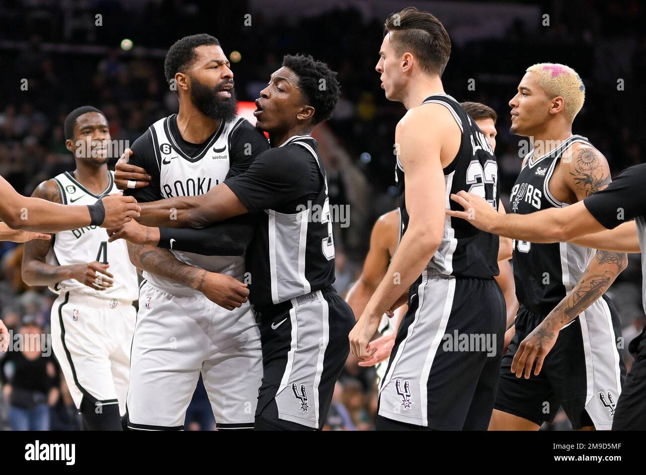Brooklyn Nets' Markieff Morris, front left, tangles with San Antonio ...