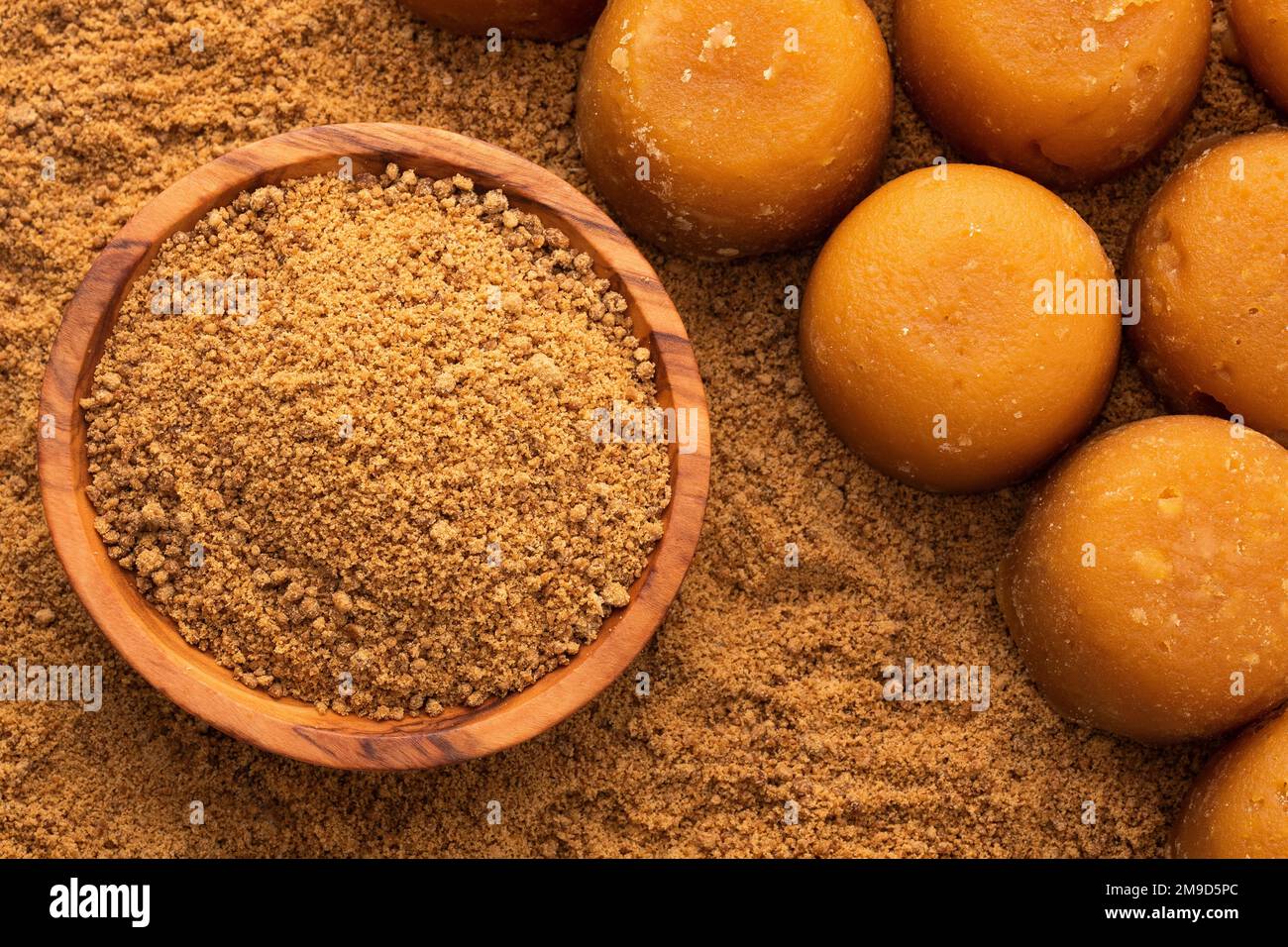 Panela in block and powder - Sugar cane candy Stock Photo - Alamy