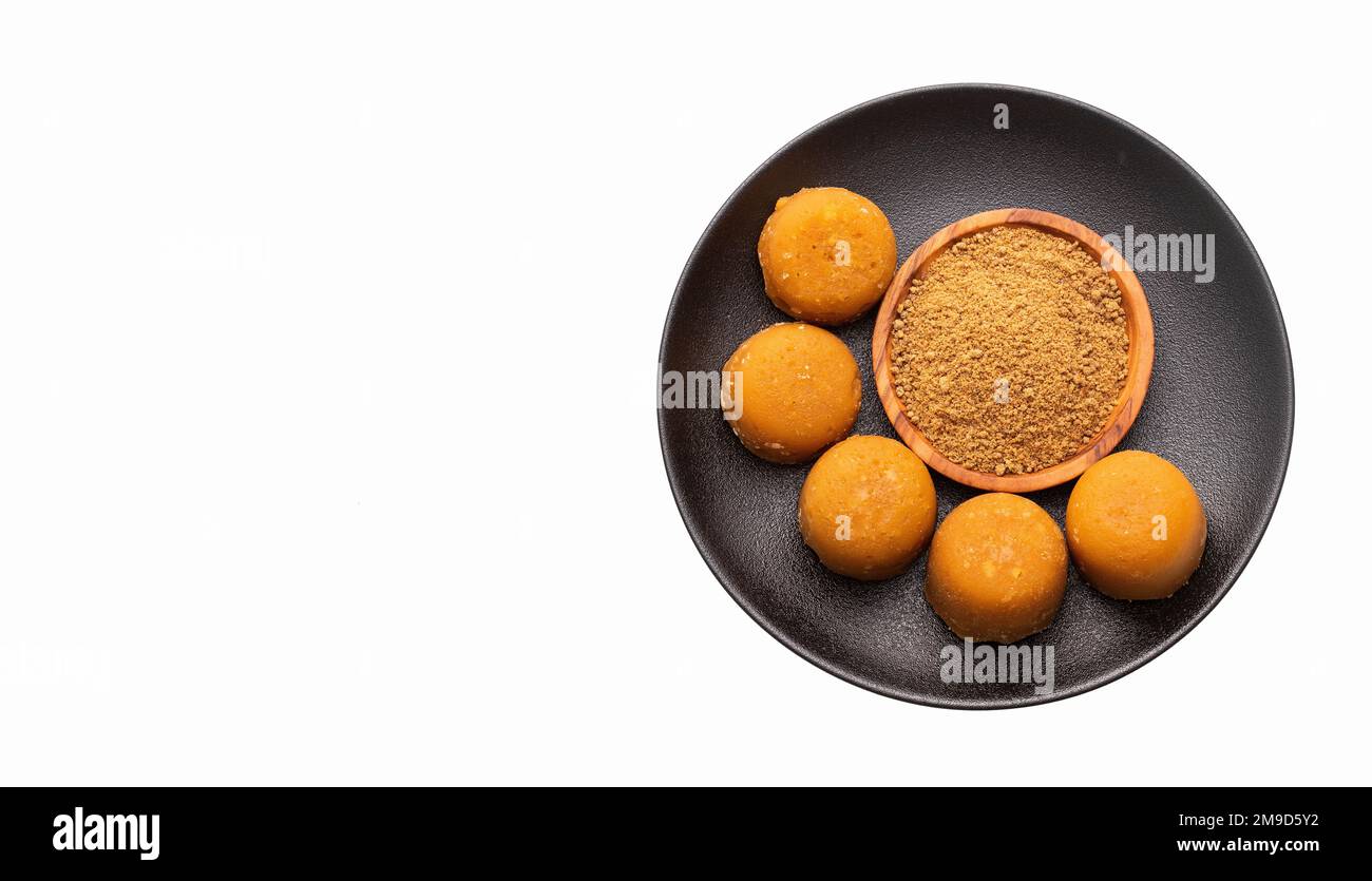 Panela in block and powder - Sugar cane candy Stock Photo - Alamy