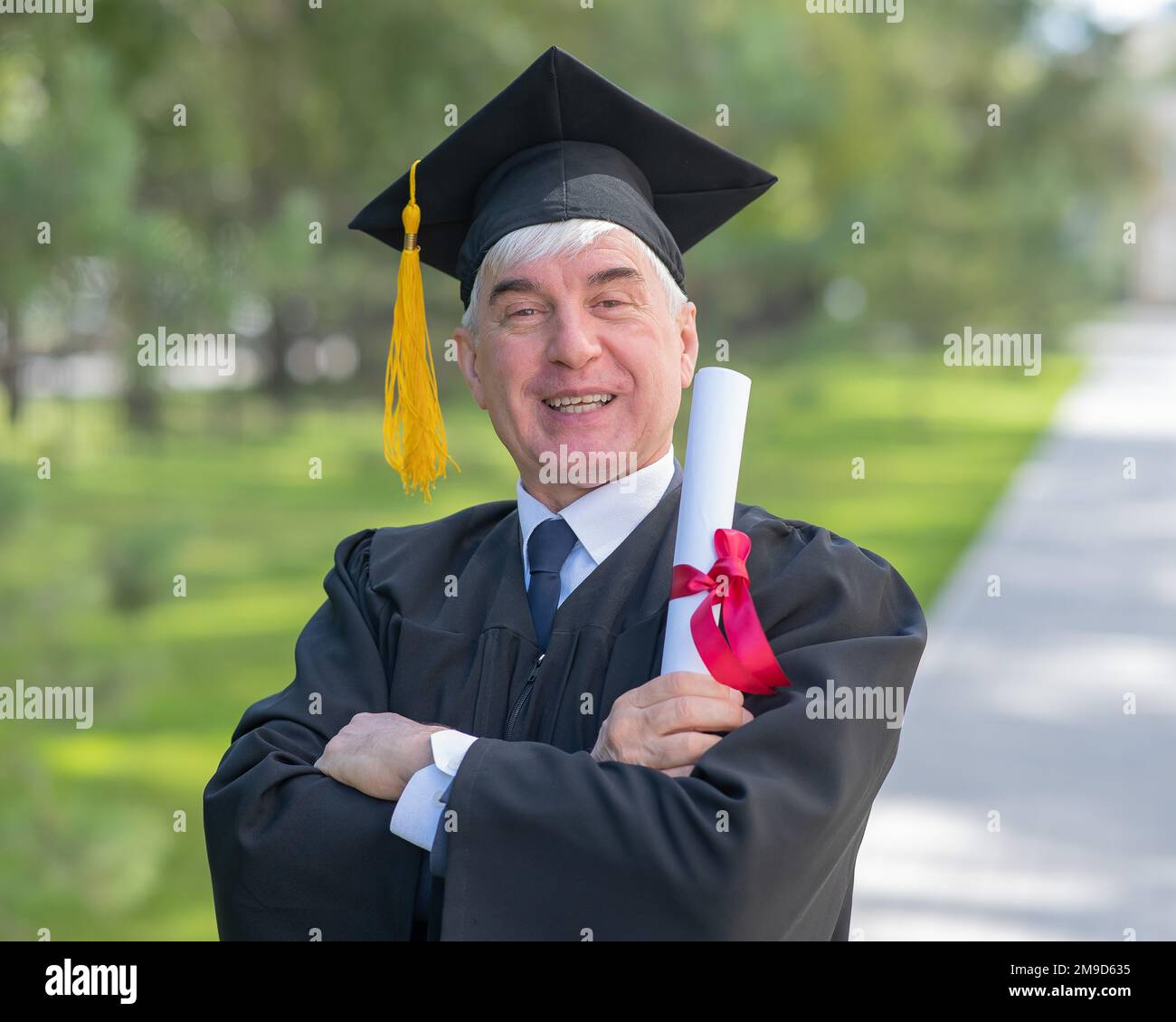 Portrait confident student graduation certificate hi-res stock ...