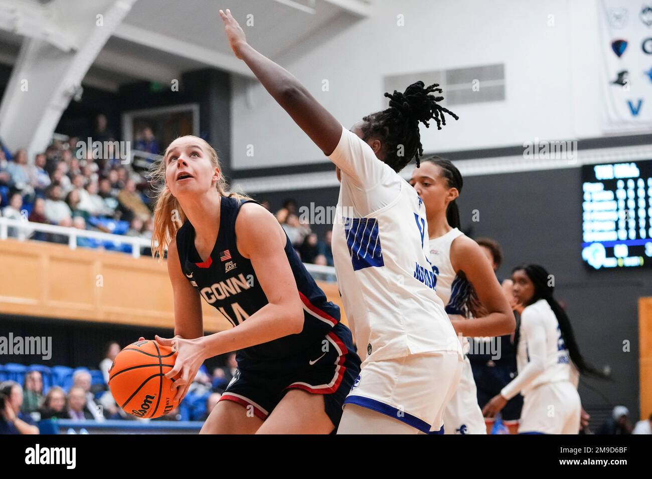 Connecticut's Dorka Juhasz looks for a shot as Seton Hall's Jala Jordan ...