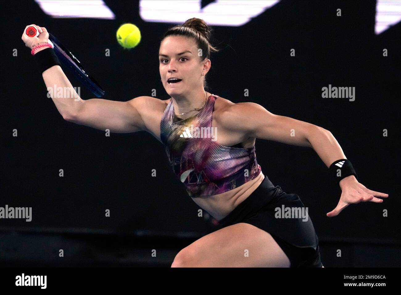 Maria Sakkari of Greece plays a forehand return to Diana Shnaider of ...