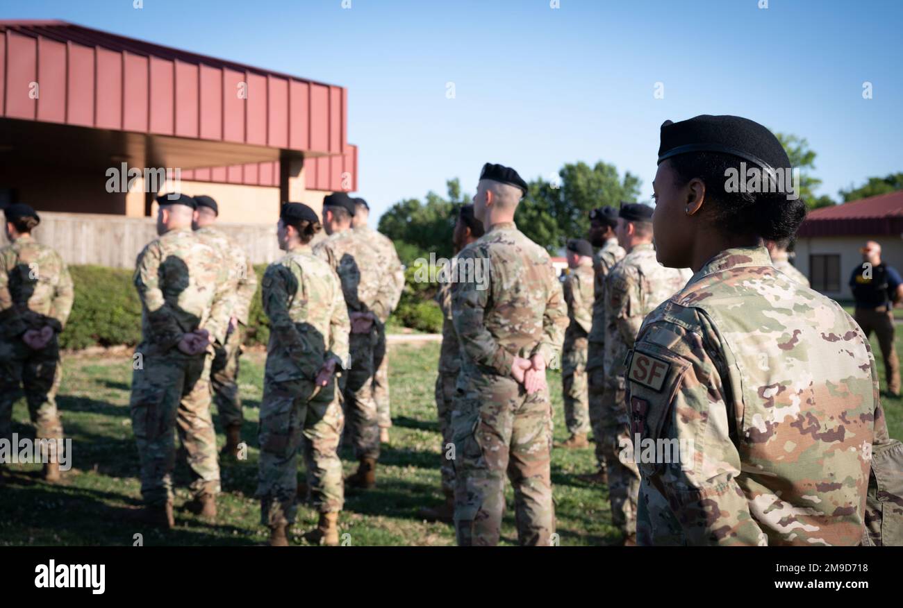 The 71st Security Forces Squadron members stand in formation to start ...
