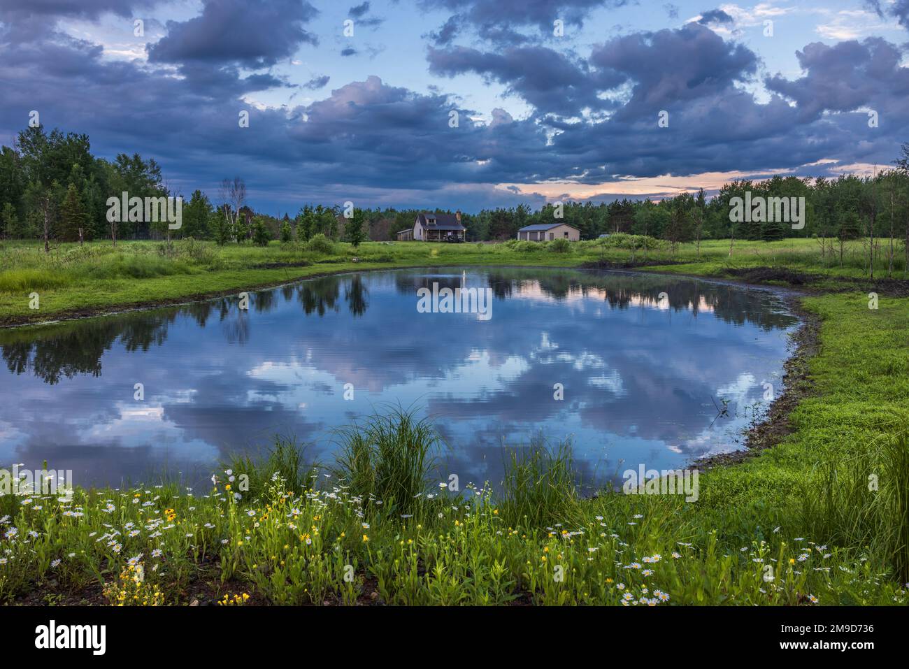 Northwoods homestead on a pretty June morning Stock Photo - Alamy