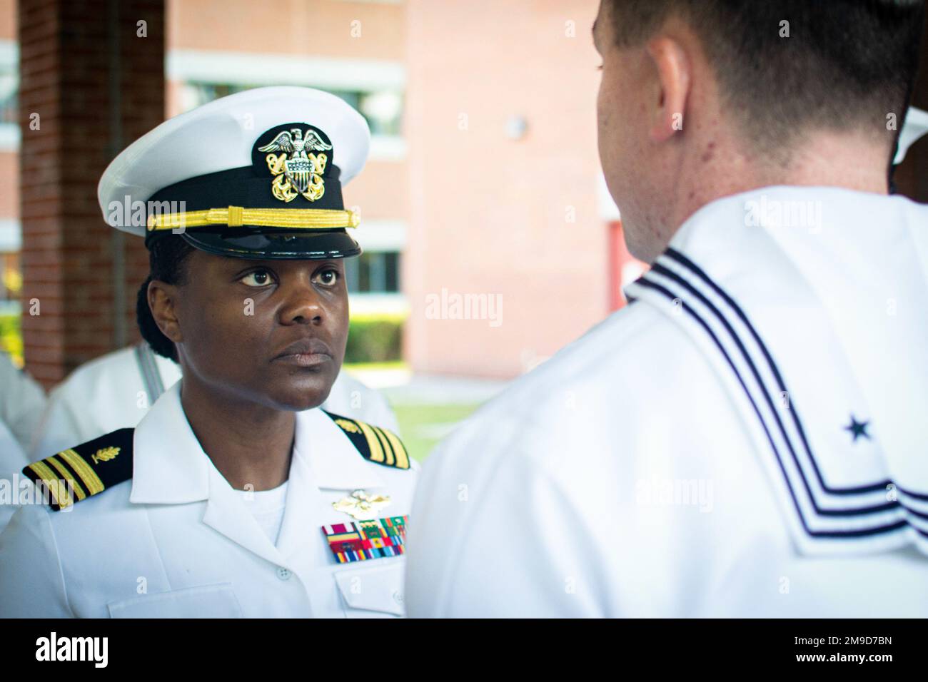 Lt. Commander Renardis Banks, left, Director for Administration ...