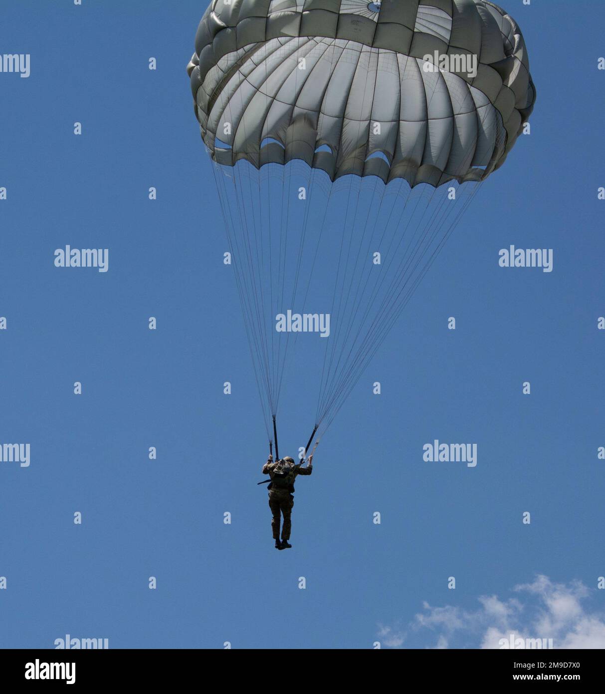 An Airmen with the 14th Air Support Operations Squadron parachutes down ...