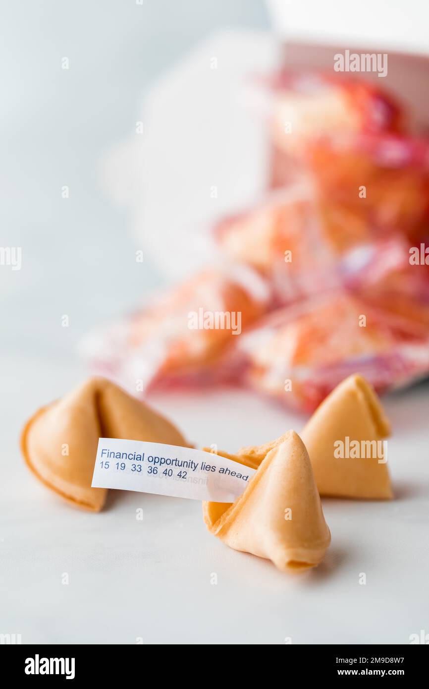 Fortune cookies with a fortune sticking out of the one in front Stock ...