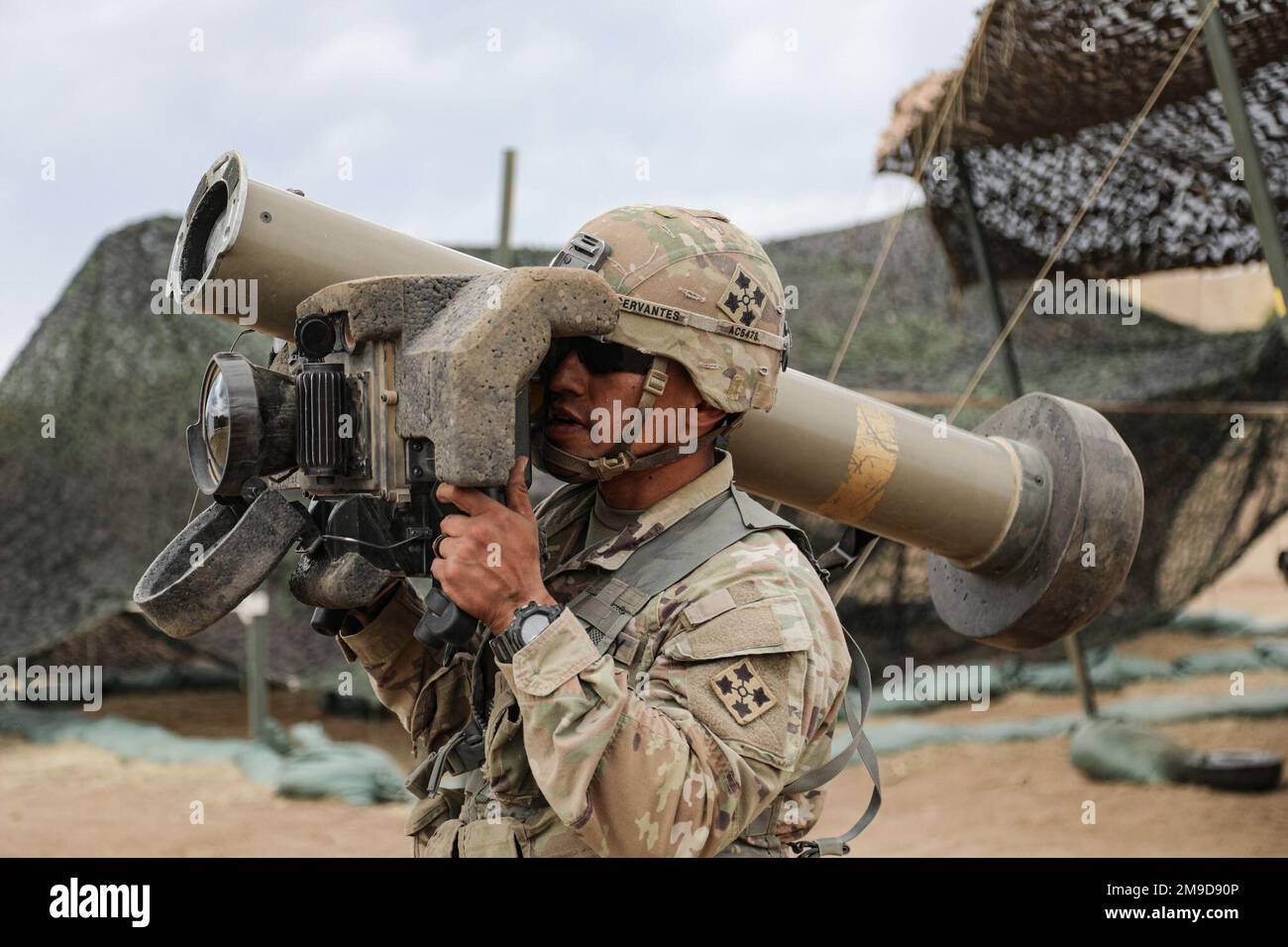 A soldier assigned to the 4th Infantry Division demonstrates the proper ...