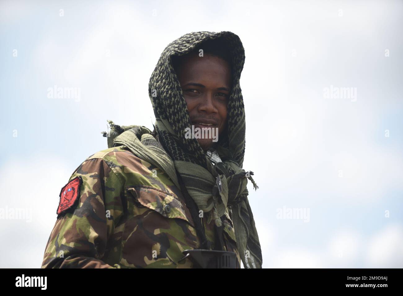 A member of the Belize Defence Force attends a range day during ...