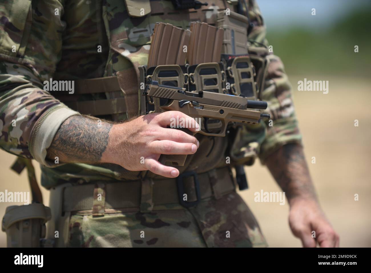 U.S. Army Sgt. Blake Tedder, Florida Army National Guard, demonstrates ...