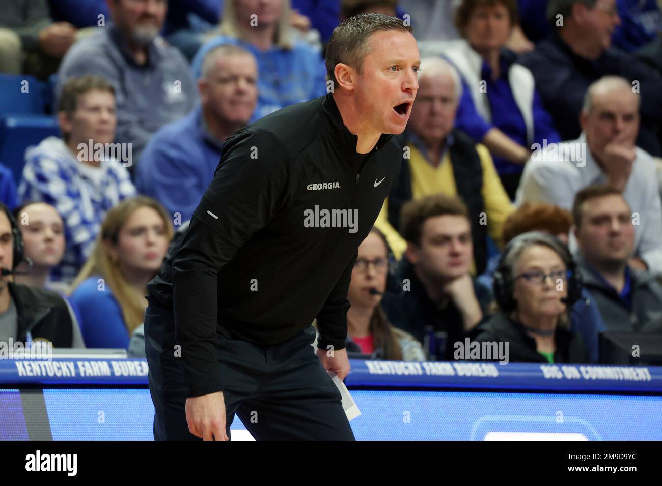 Georgia head coach Mike White yells to his team during the first half ...