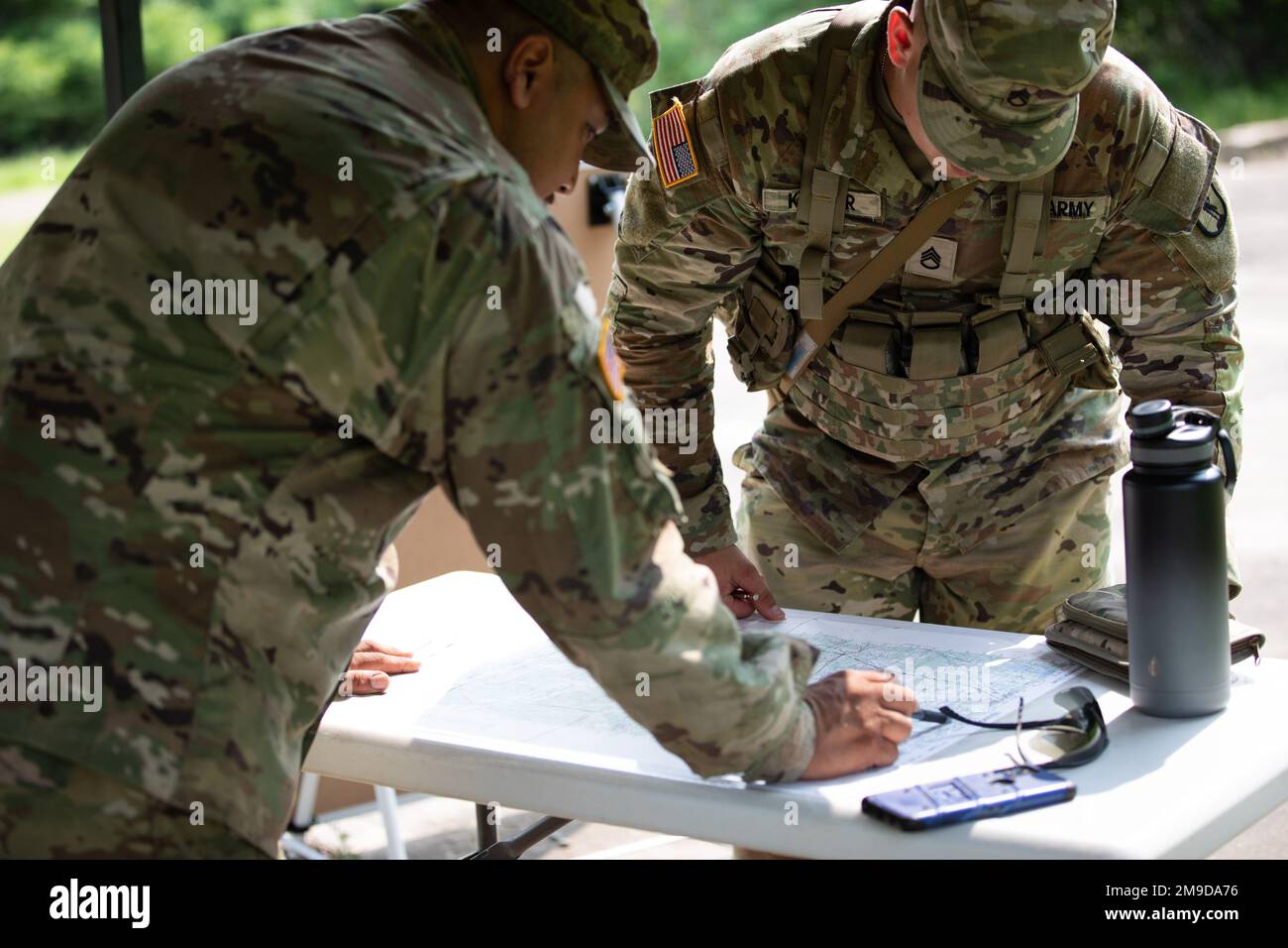 Staff Sgt. Bryan Kummer, Nebraska National Guard, identifies features ...