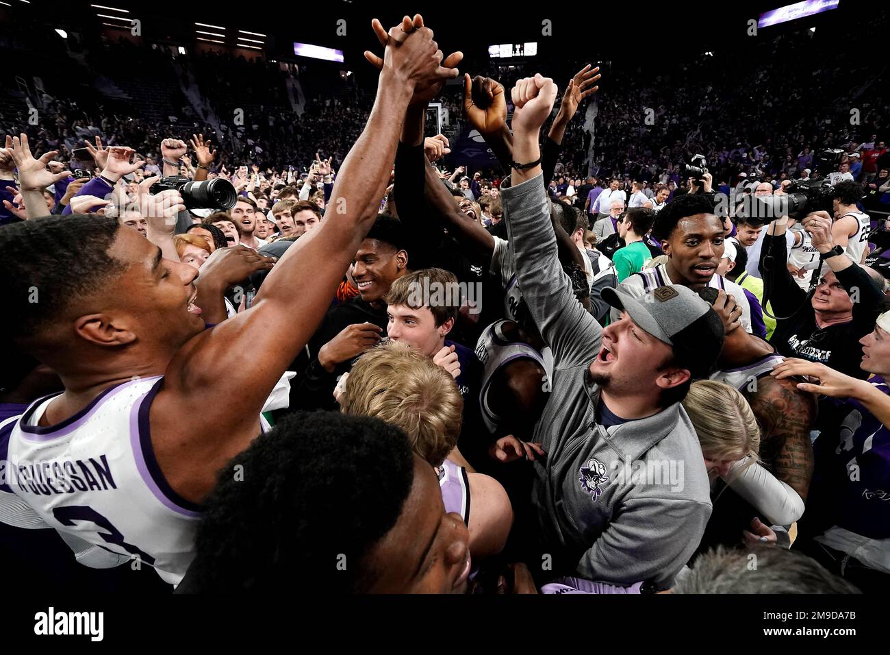 Kansas State forward David N'Guessan (3) celebrates with fans after an ...