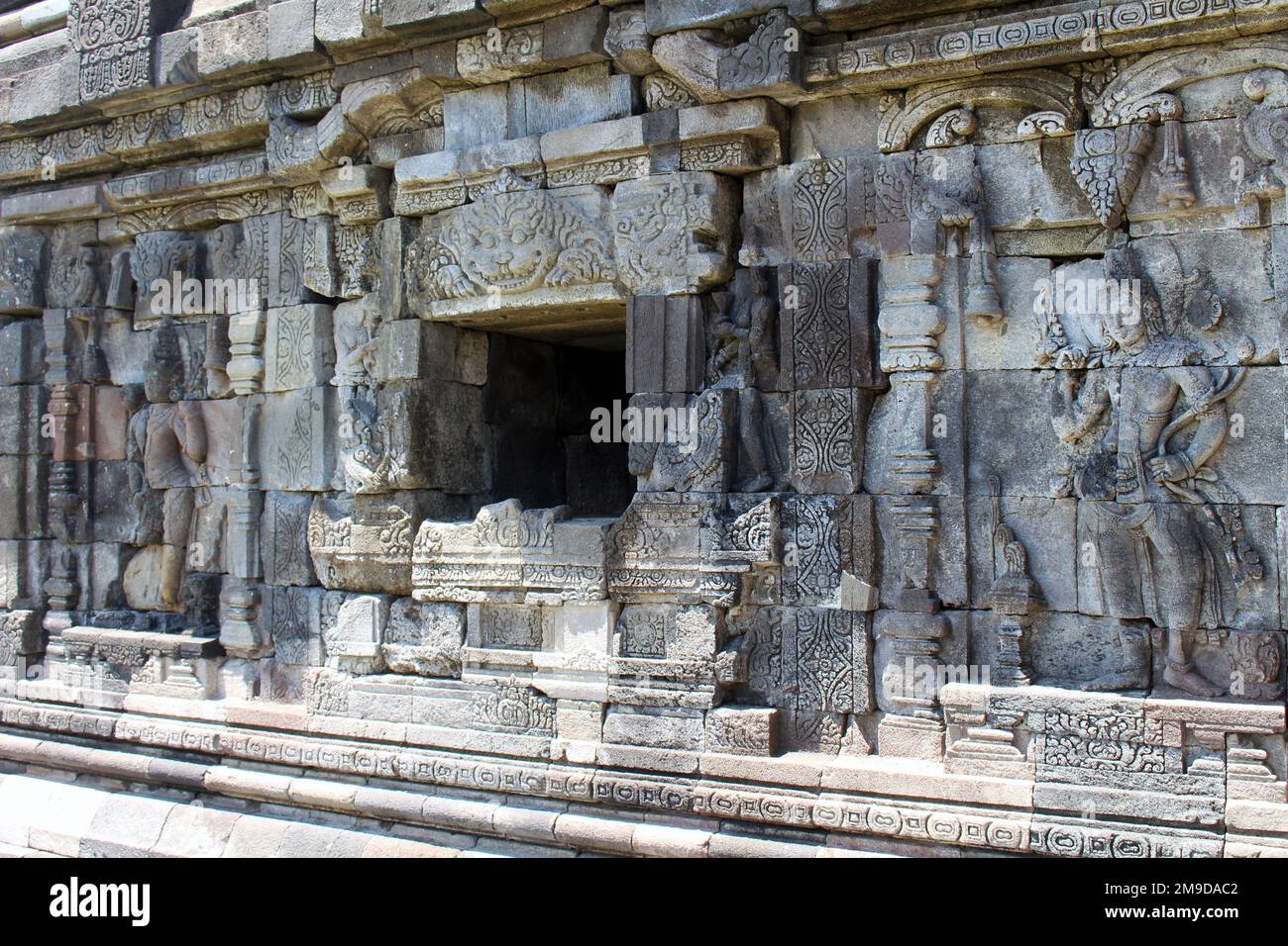 Detailed carvings on Plaosan temple wall in Java, Indonesia. Taken in ...