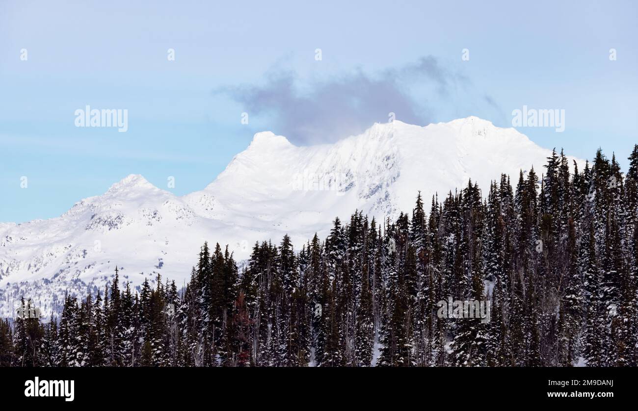 Snow and Cloud covered Canadian Nature Landscape Background. Winter ...
