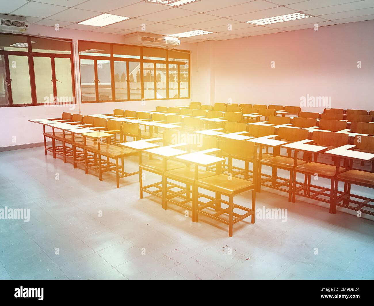 Wooden chairs in the classroom background Stock Photo - Alamy