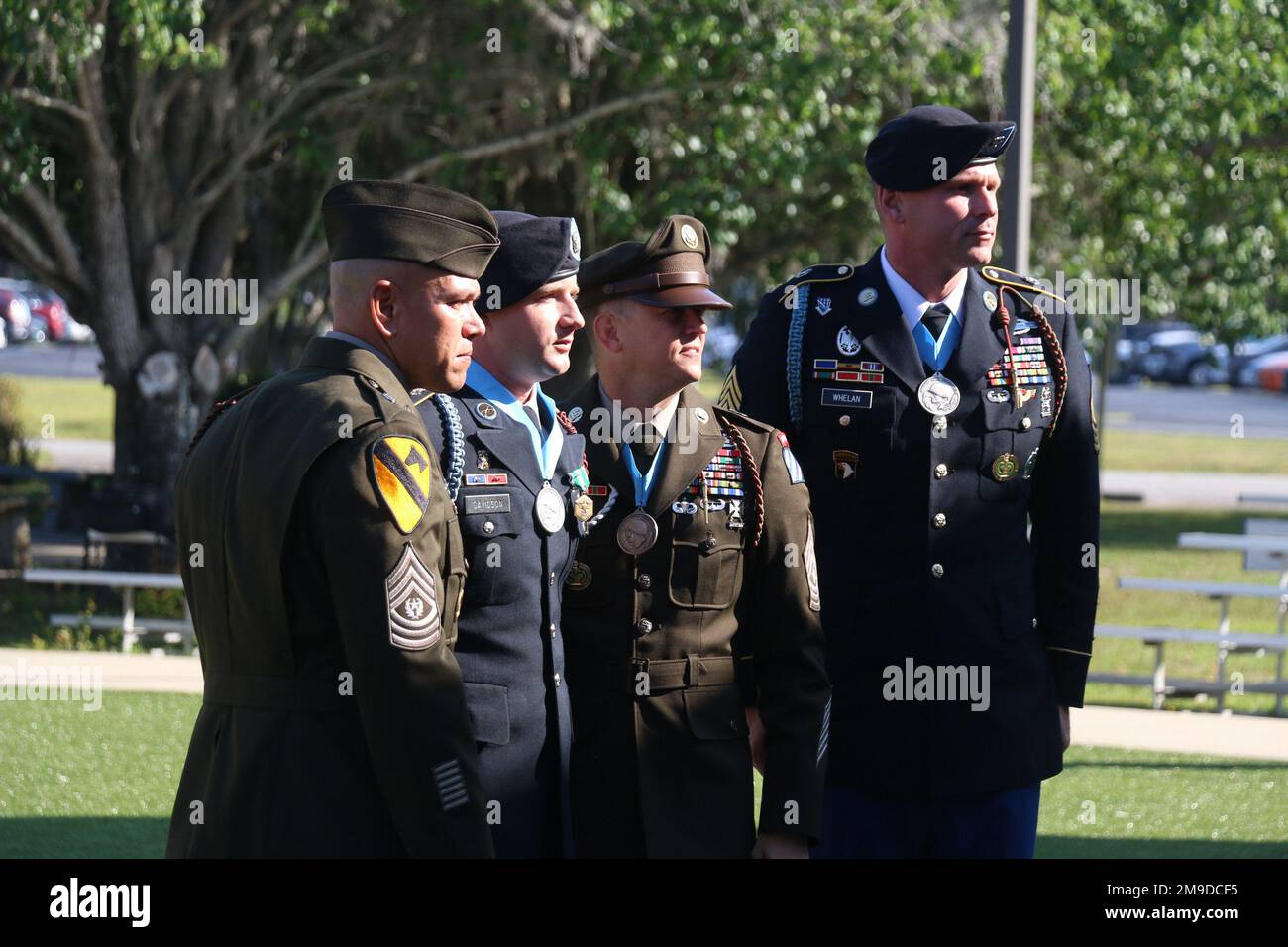 Staff Sgt. Hunter Davidson, center left, assigned to the "Can Do ...