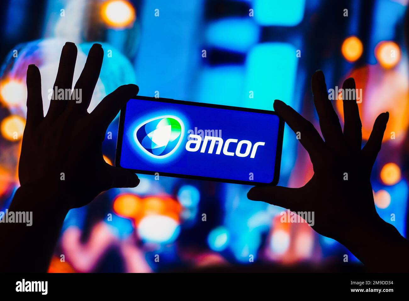 In this photo illustration, the Amcor plc logo is displayed on a ...