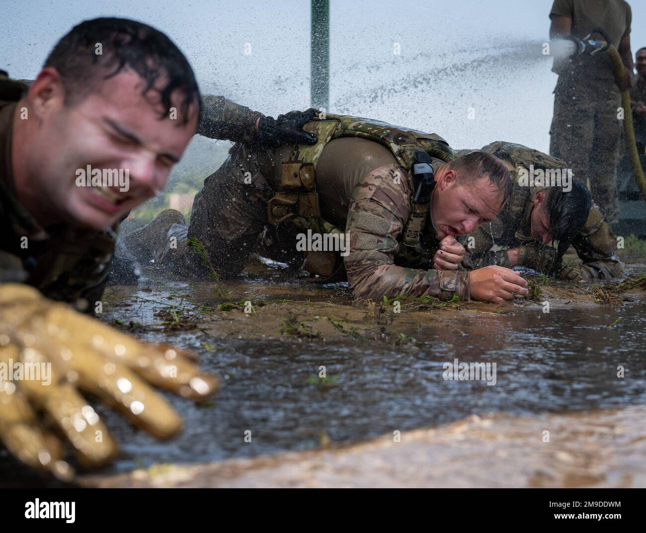 Low crawl in mud hi-res stock photography and images - Alamy