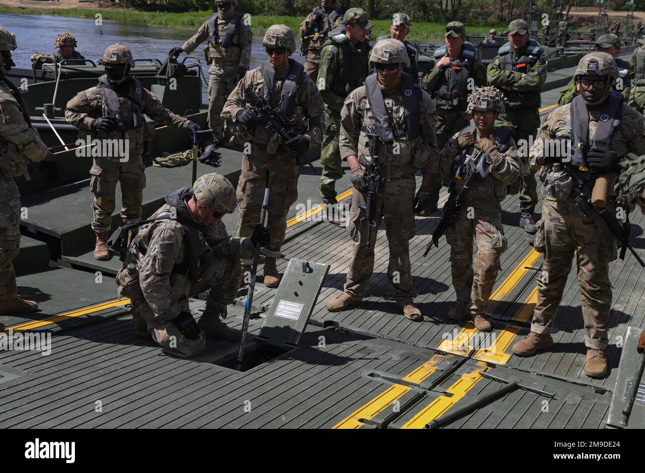 U.S. Soldiers with the 74th Multi-Role Bridge Company, 62nd Engineer ...