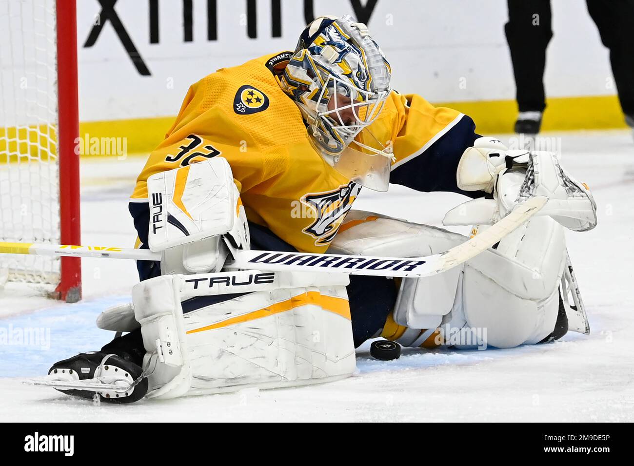 Nashville Predators goaltender Kevin Lankinen (32) stops a shot by the ...