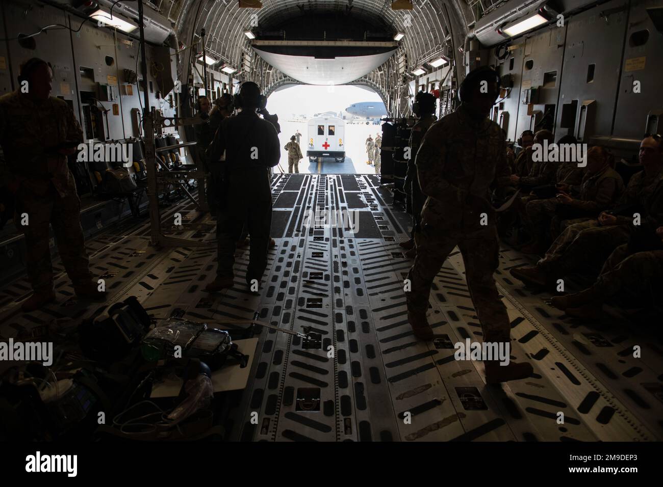 U.S. Airmen from a 60th Medical Group Critical Care Air Transport Team ...