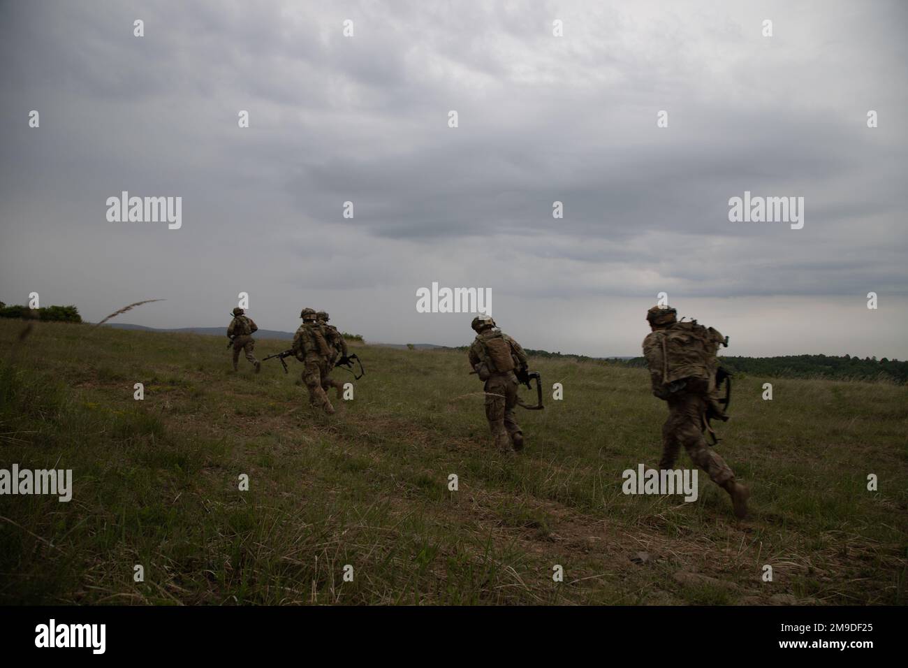 LEST, Slovakia - Soldiers from Apache Troop, 2nd Cavalry Regiment, run ...