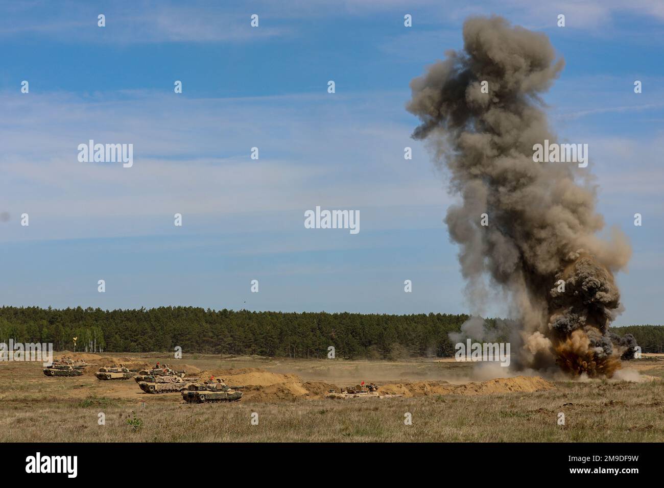 A dynamite explosion near M1A2 Abrams tanks assigned to 1st Battalion ...