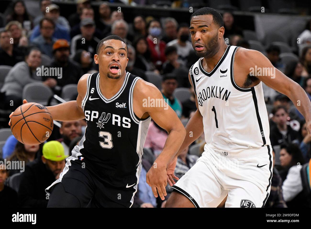 San Antonio Spurs' Keldon Johnson (3) drives against Brooklyn Nets' T.J ...