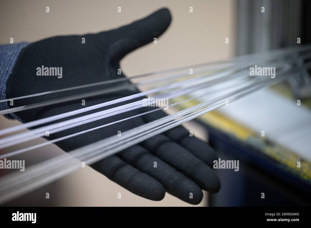 Mainz, Germany. 12th Jan, 2023. A Schott AG employee works in the ...