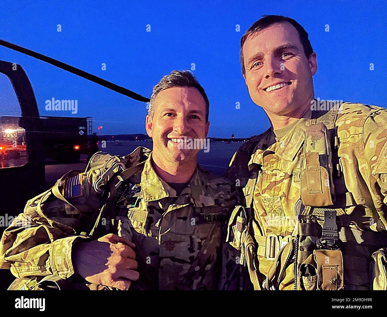 Maj. Chaz Allen (left) and Maj. Kurt Hunt (right) complete a ceremonial ...