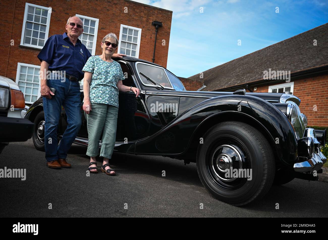 Steve Kinch and his wife display a mid-1950s Wolseley 6/80 retired ...