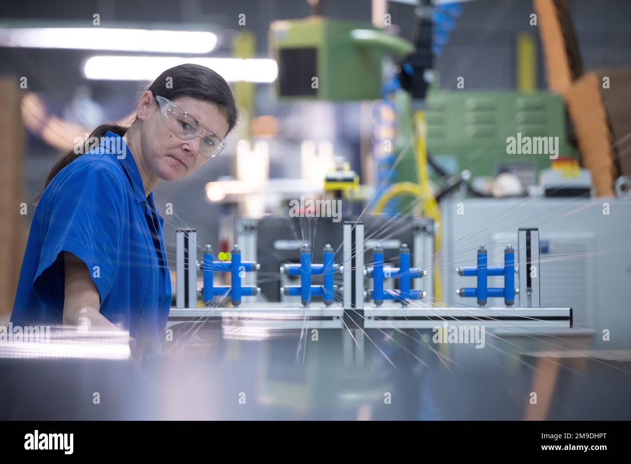 Mainz, Germany. 12th Jan, 2023. A Schott AG employee works in the ...
