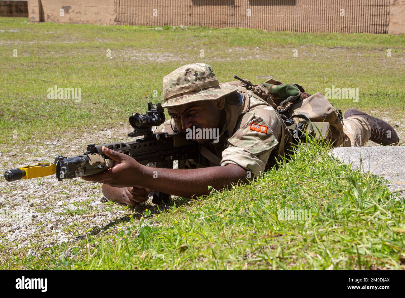 A soldier of the Royal Bermuda Regiment provides security while ...