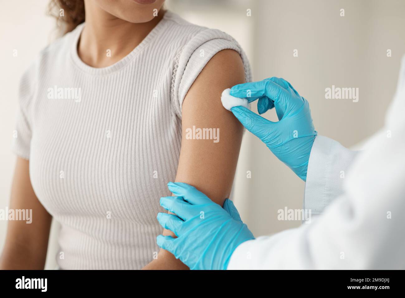 I need a nice clean spot before the injection. an unrecognisable doctor ...