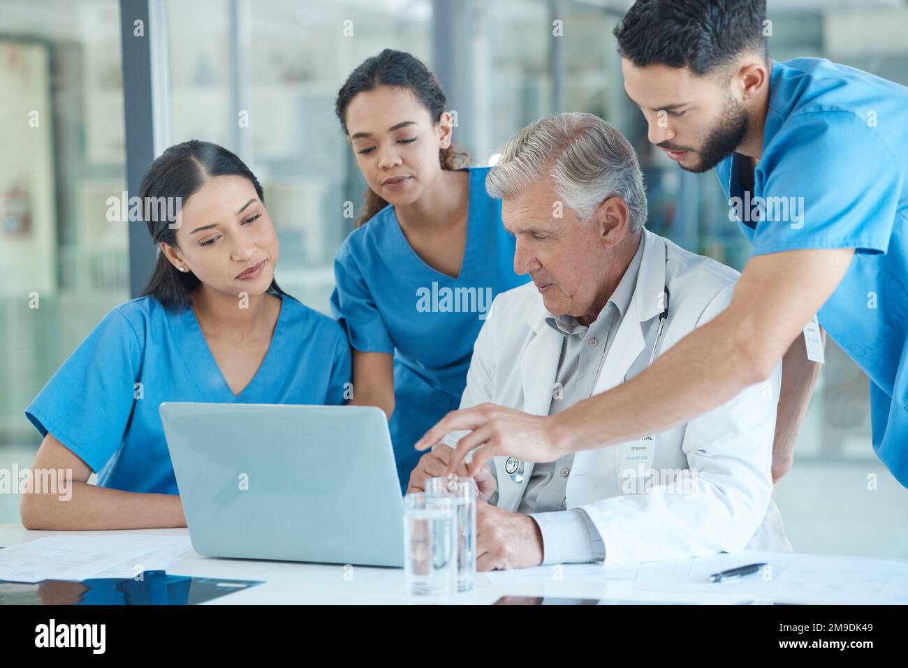 Your input is always valued. a group of medical staff having a meeting ...